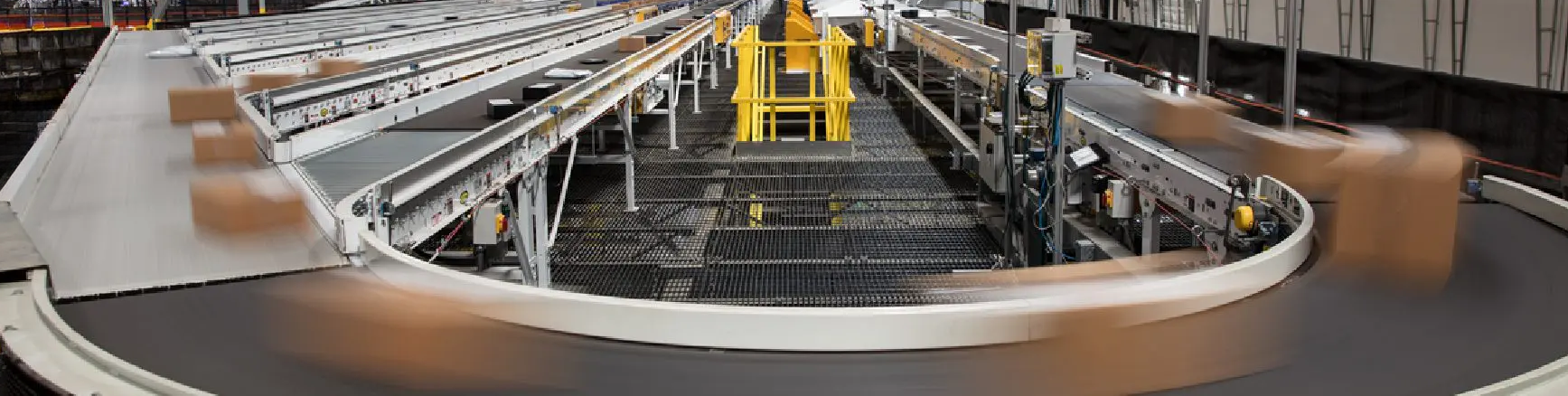 Eligiendo la Mejor Banda Transportadora para Almacenes de Comercio Ele